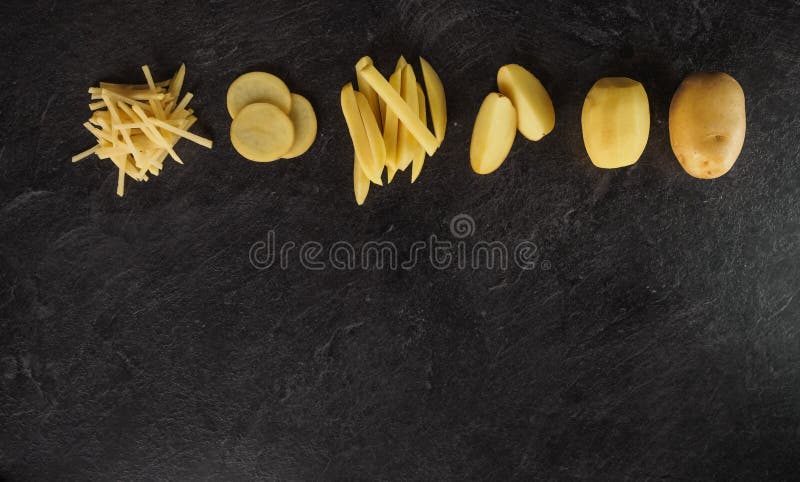 Different Cuts of Potatoes on a Black Textured Background Stock Image ...