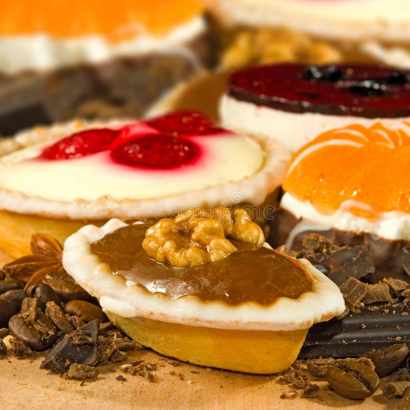 Different Delicious Cakes Closeup Stock Photo - Image of cookies ...