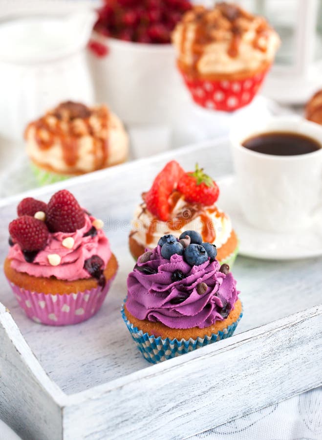 Different Delicious Cupcakes and Coffee Cup Stock Photo - Image of ...
