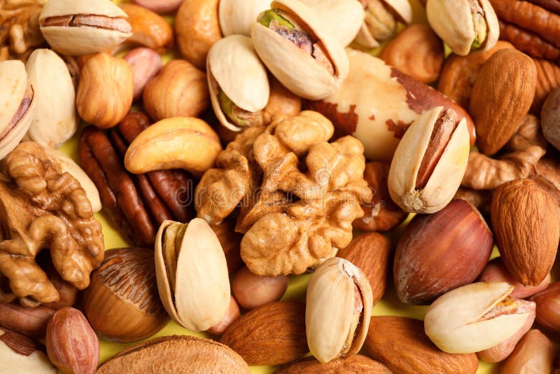 Different Delicious Nuts As Background, Closeup View Stock Image ...