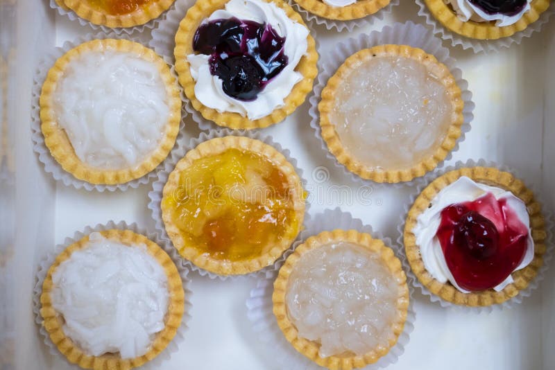 Different Delicious Tarts in Box Stock Photo - Image of catering ...