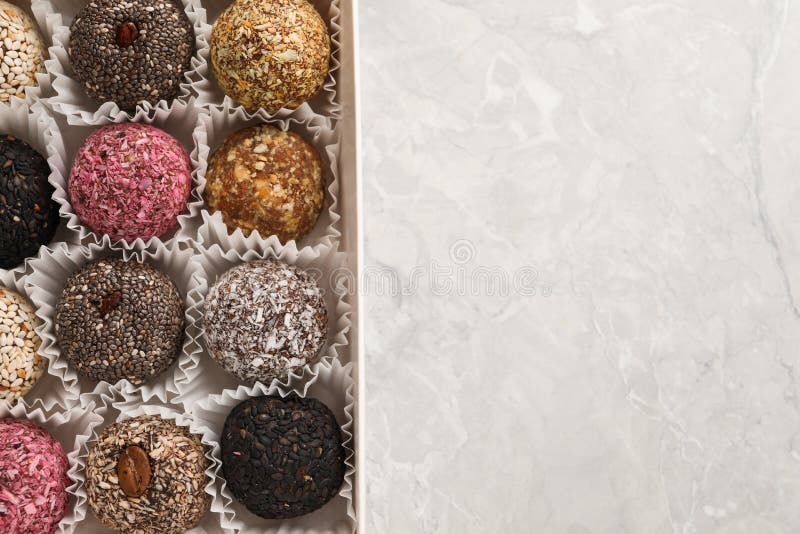 Different Delicious Vegan Candy Balls on Light Grey Marble Table, Top ...