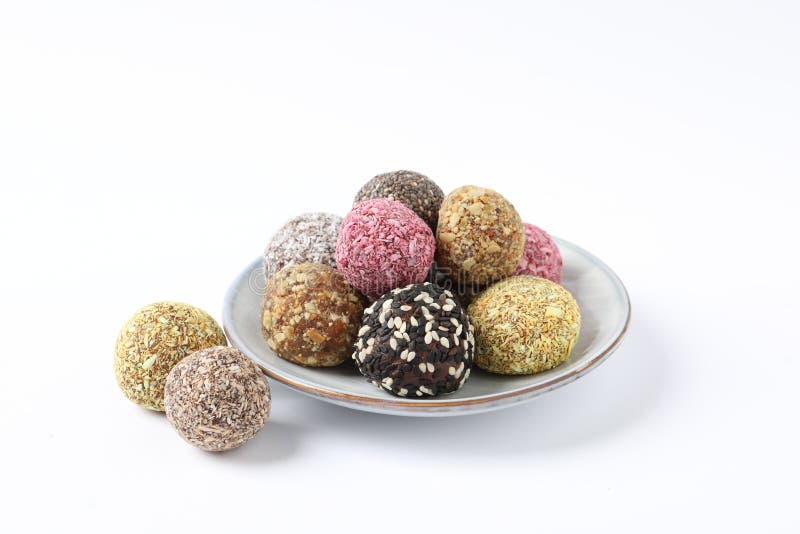Different Delicious Vegan Candy Balls on White Background Stock Image ...