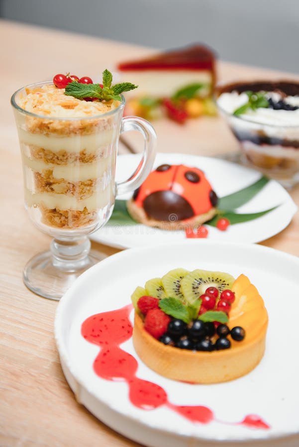 Different Desserts on the Table in a Cafe Stock Photo - Image of ...