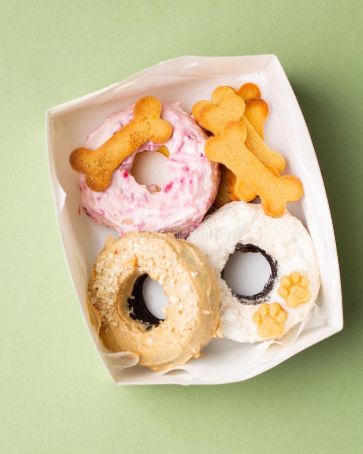 Different Donuts and Doughnuts on Green Surface Top View Stock Image ...
