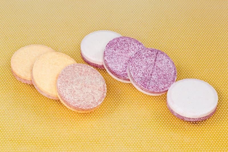 Different Effervescent Tablets on Yellow Surface, Close-up Stock Photo ...