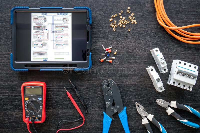 Different Electrical Tools on Wooden Background, Flat Lay. Stock Photo ...