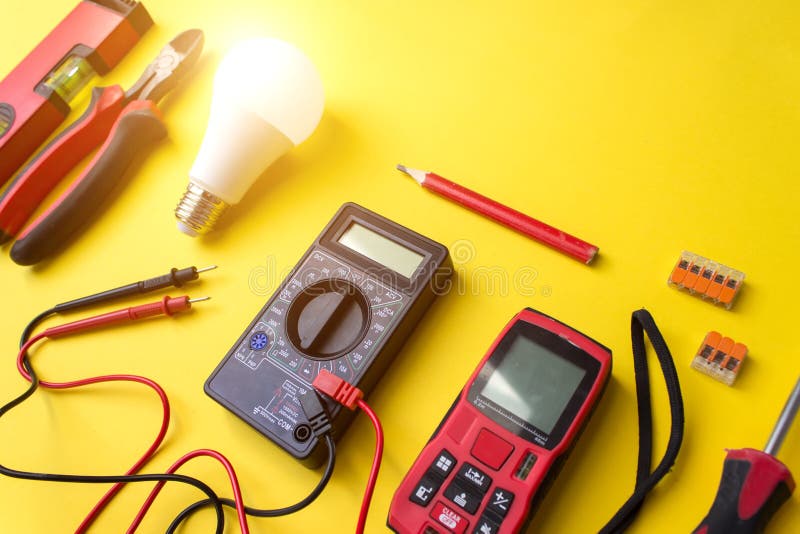 Different Electrical Tools on Yellow Background with Shine. Components ...