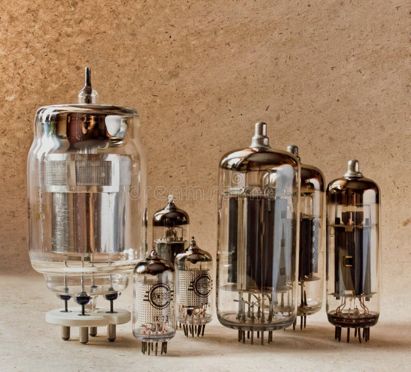 Different Electronic Vacuum Tubes on Kraft Paper Background in Warm Colours. Stock Photo - Image ...