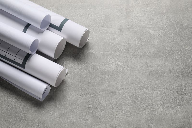 Different Engineering Drawings on Grey Textured Table, Above View ...