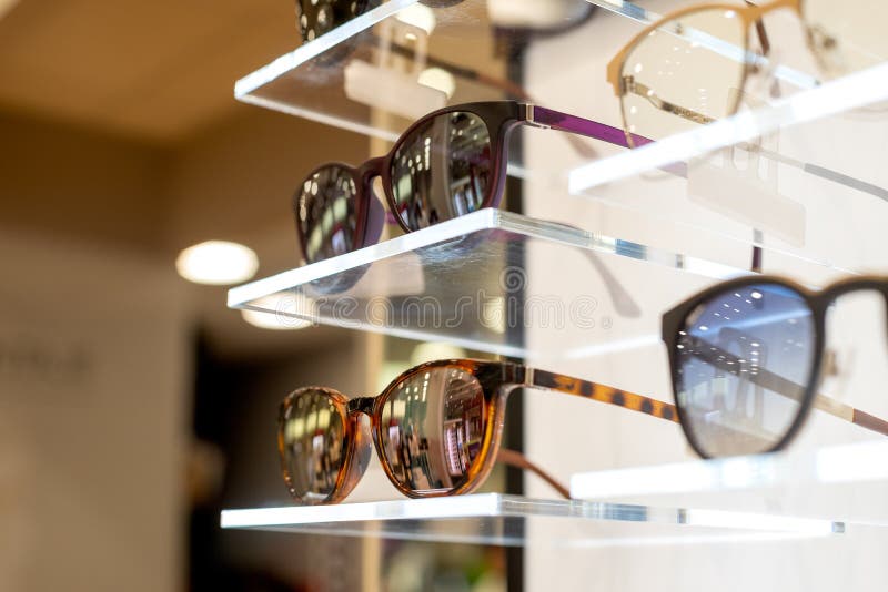 Different Eyeglasses on the Table in the Eyewear Shop Stock Image ...
