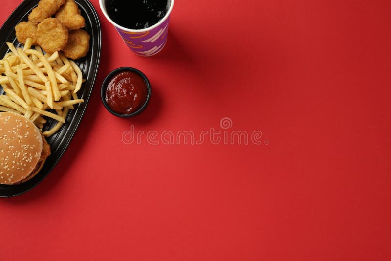 Different Fast Food on Red, Flat Lay. Space for Text Stock Image ...