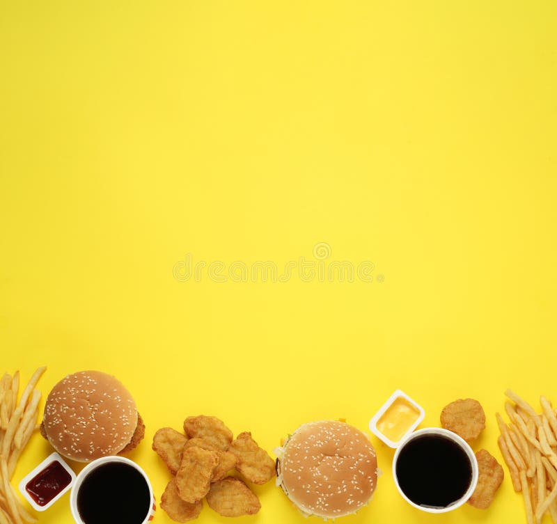 Different Fast Food on Yellow Background, Flat Lay. Space for Text ...