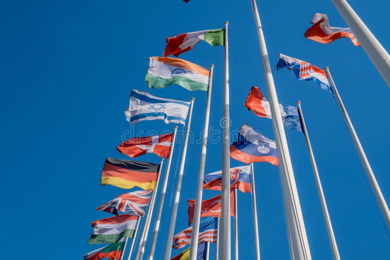 Different Flags Fluttering on Flagpoles Stock Image - Image of sunny ...