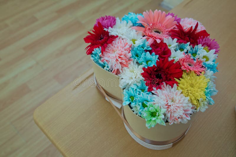 Different Flowers in Many Bright Colors in a Mixed Heart Bouquet Stock ...