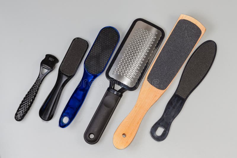 Different Foot Care Tools on a Gray Surface, Top View Stock Photo ...