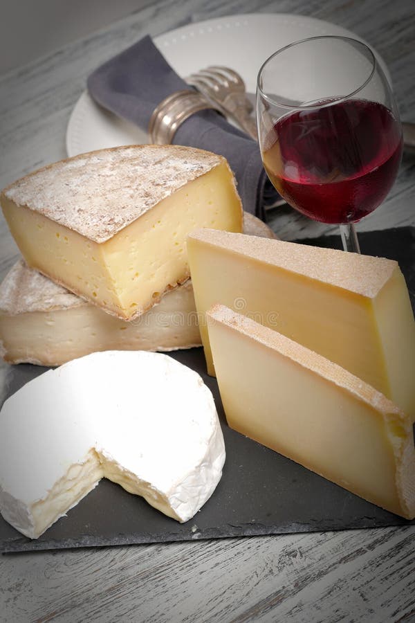 Different French Cheeses with a Glass of Wine Stock Photo - Image of ...