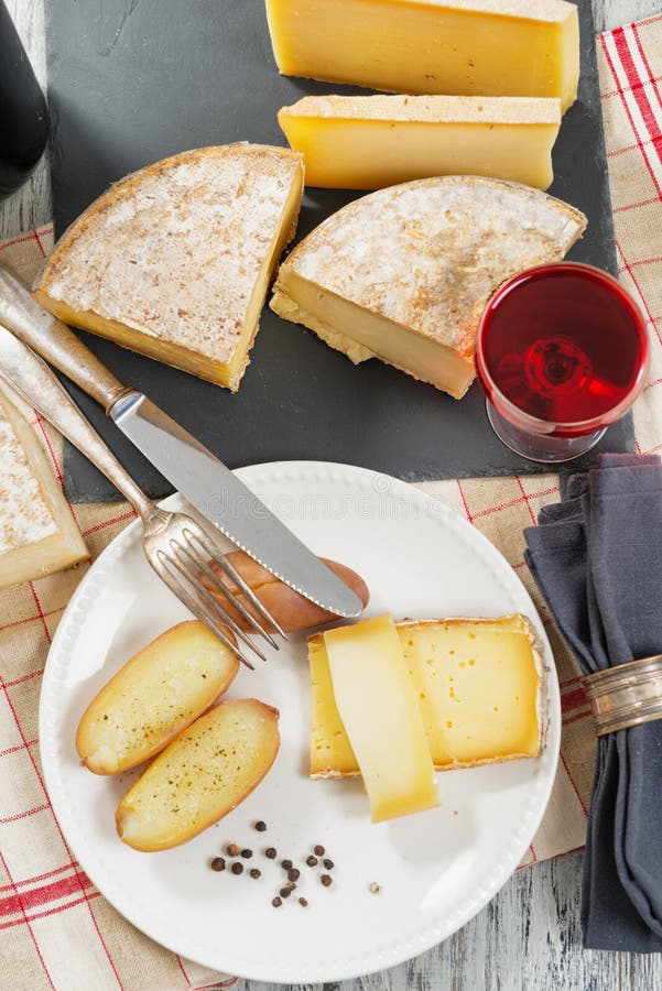 Different French Cheeses with a Glass of Wine Stock Photo - Image of ...