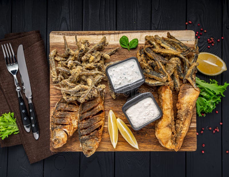 Different Fried Fish on the Board Stock Image - Image of appetizer ...