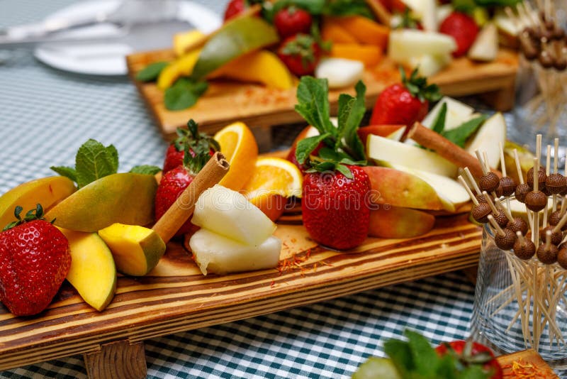 Different Fruits Slices on a Wooden Tray Stock Image - Image of slices ...