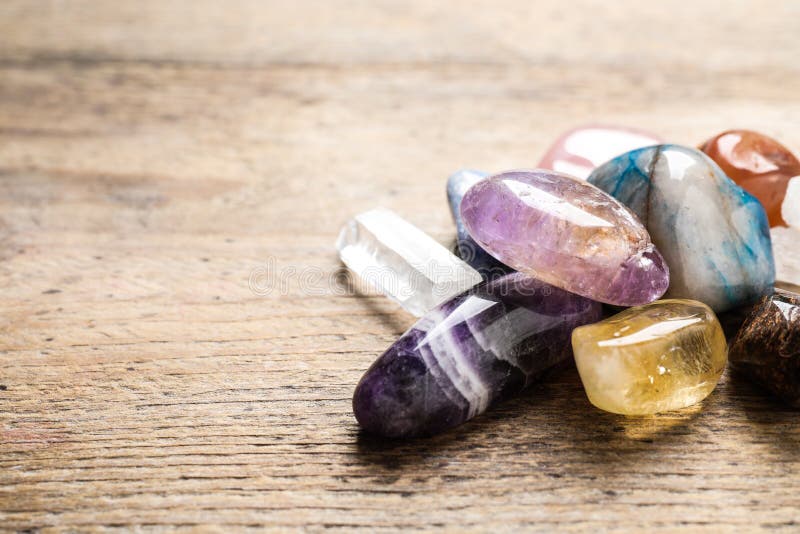 Different Gemstones on Wooden Table Stock Photo - Image of quartz, rock ...