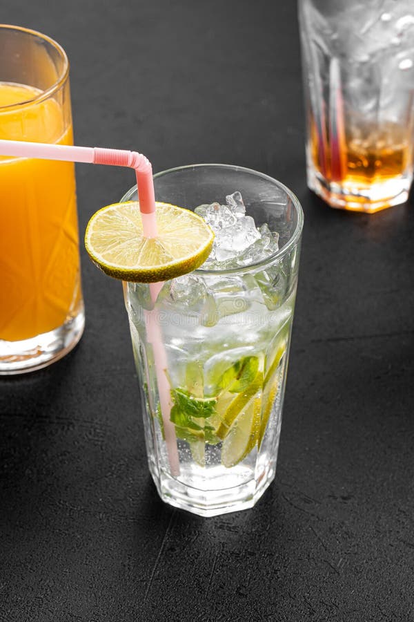 Different Glasses with Assorted Cocktails Stock Photo - Image of citrus ...
