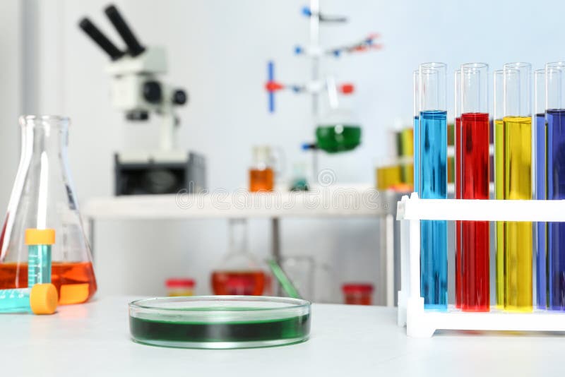 Different Glassware with Samples on Table in Laboratory Stock Photo ...