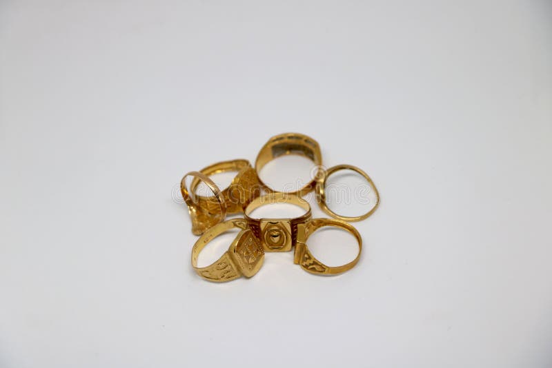 Different Gold Rings with White Background Stock Image - Image of shiny ...
