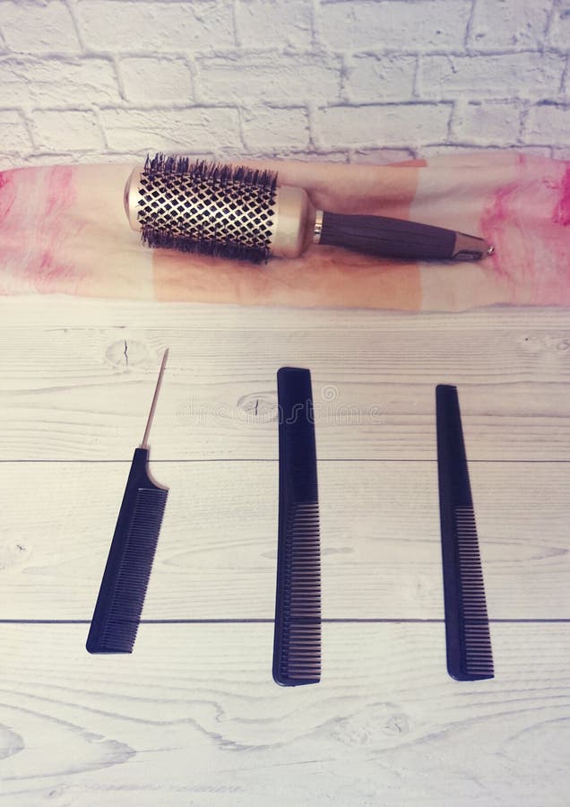 Different Hairdressing Tools Lie on the Table at the Master in a Beauty ...