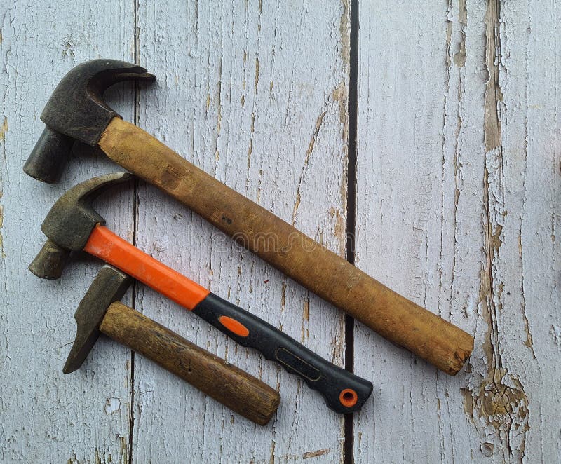 Different Hammers on a Wooden Table. Stock Image - Image of ...