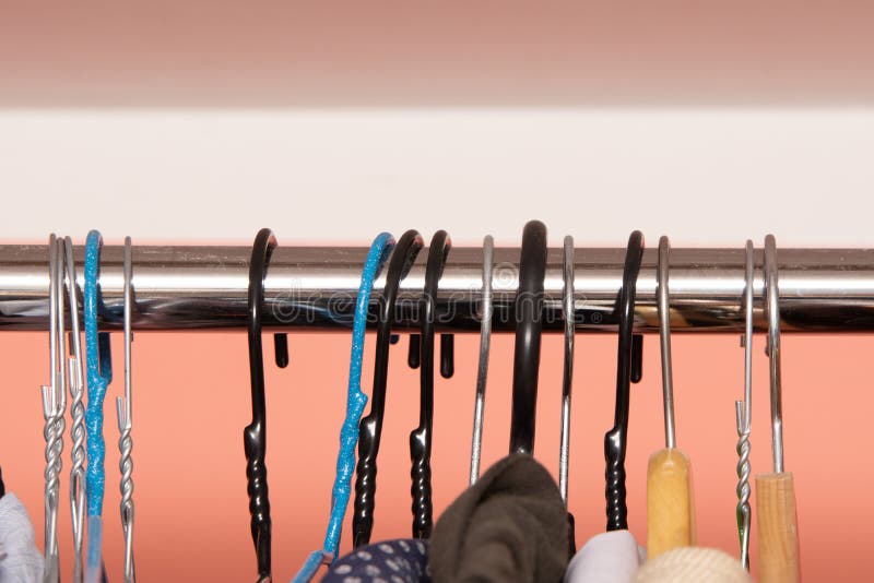 Different Hangers Hanging on the Tube Stock Photo - Image of hangers ...