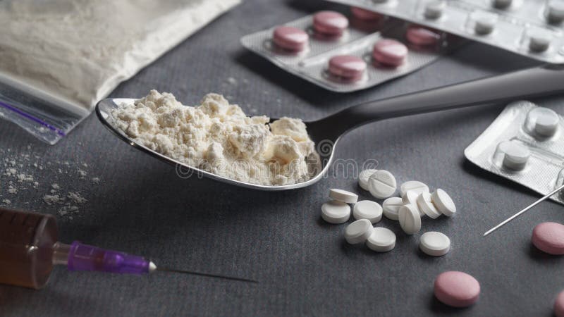 Different Hard Drugs on Light Grey Table, Closeup Stock Photo - Image ...