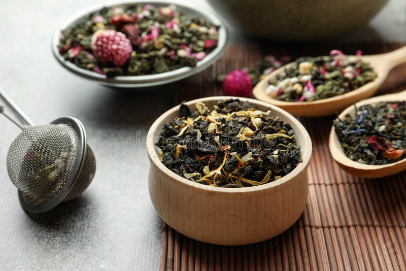 Different Herbal Teas on Grey Table, Closeup Stock Photo - Image of ...