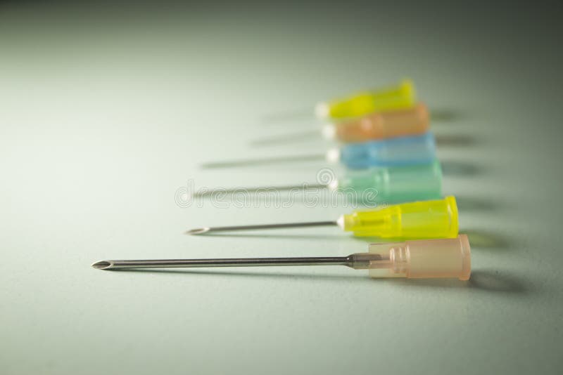 Different Injection Needles Arranged in Rows. Stock Image - Image of ...