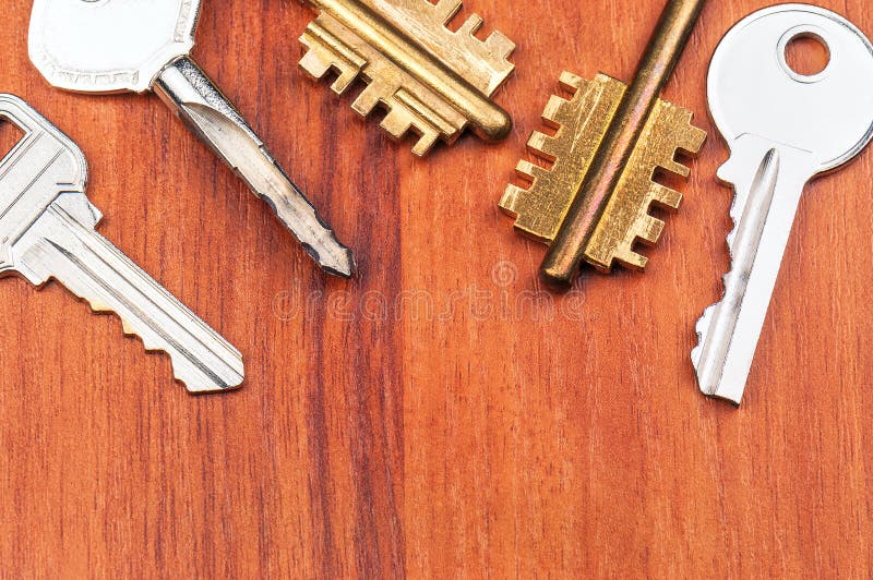 Different Keys on Wooden Table Stock Image - Image of imagery, bronze ...