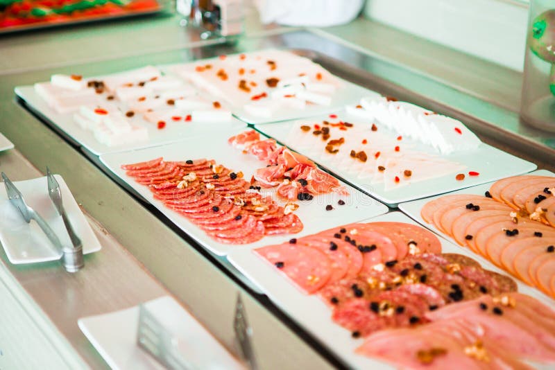 Different Kind of Ham on the Table for Breakfast in the Hotel Stock ...