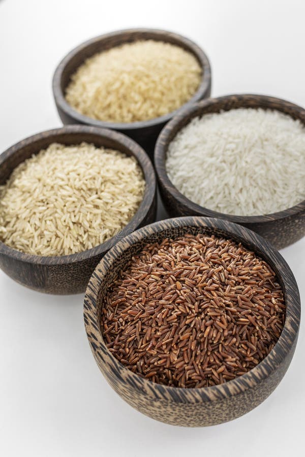 Different Kinds of Asian Rice Grains in Bowls on White Background Stock ...