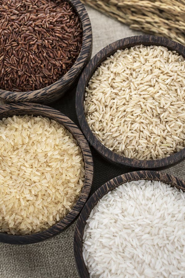 Different Kinds of Asian Rice Variety Grains in Rustic Setting Display ...