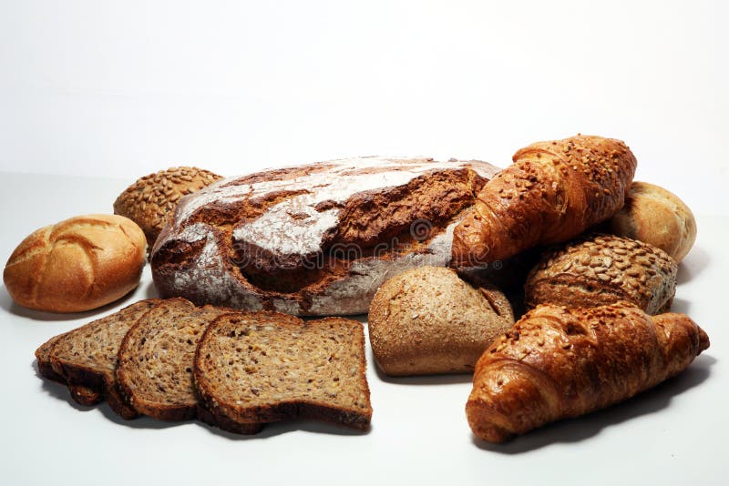 Different Kinds of Bread and Bread Rolls on Board from Above Stock ...