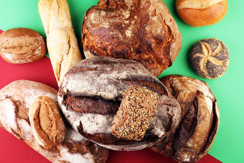 Different Kinds of Bread and Bread Rolls on Board from Above. Kitchen ...