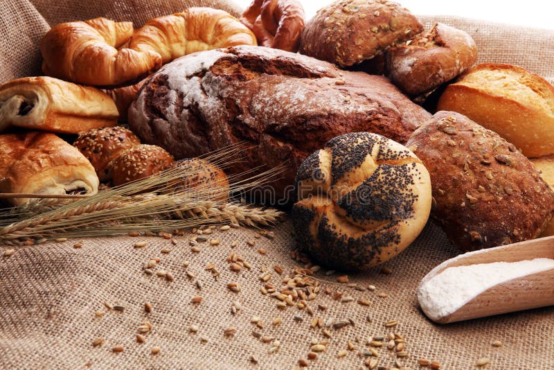 Different Kinds of Bread and Bread Rolls on Burlap Sack. Kitchen Stock ...