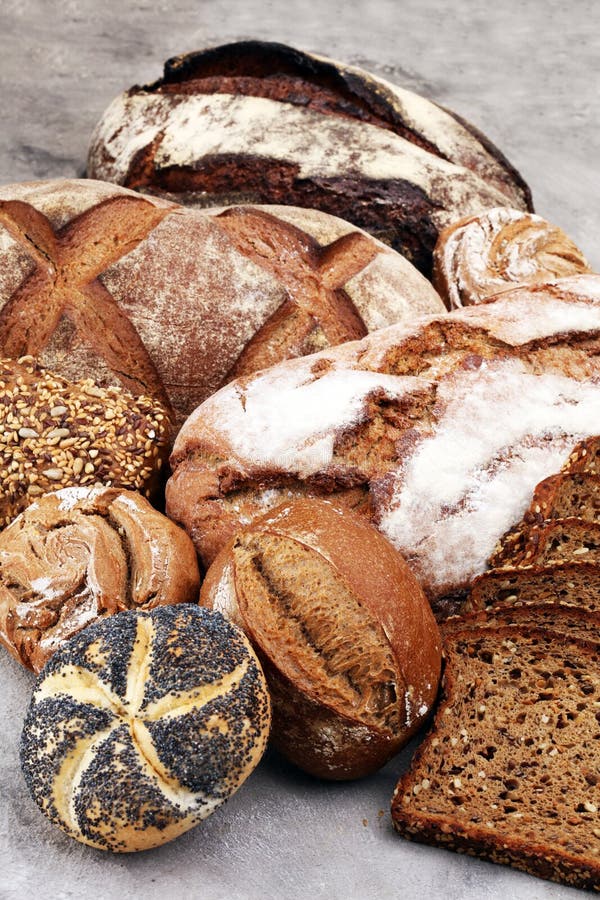Different Kinds of Bread and Bread Rolls. Kitchen or Bakery Post Stock ...