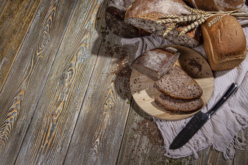 Bread, Wheat, Wood and Knife Stock Image - Image of board, table: 294120463