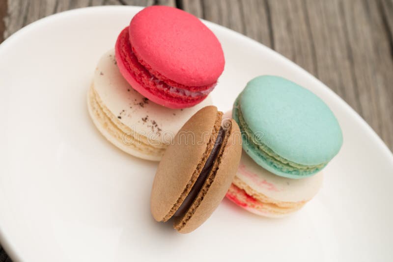 Different Kinds of Macaroon on White Plate Stock Image - Image of table ...