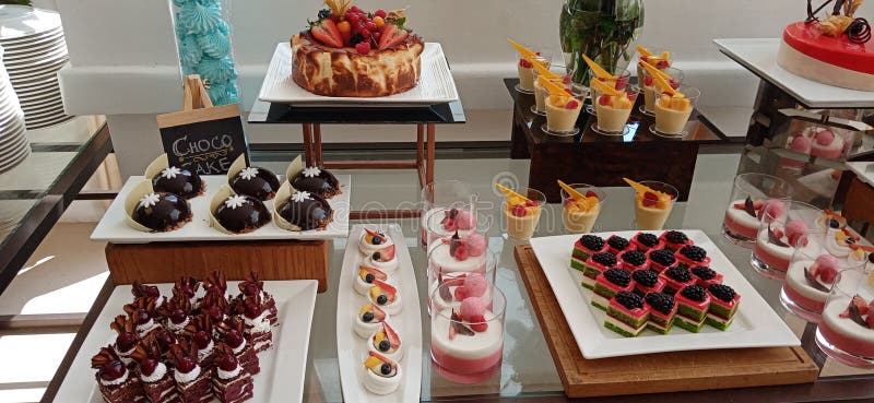 Different Kinds of Mixed Mini Delicious Cakes. with Different Colors ...