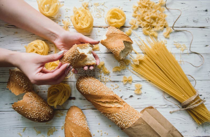 Different Kinds of Pasta on Wooden Table, Bread Stock Image - Image of ...