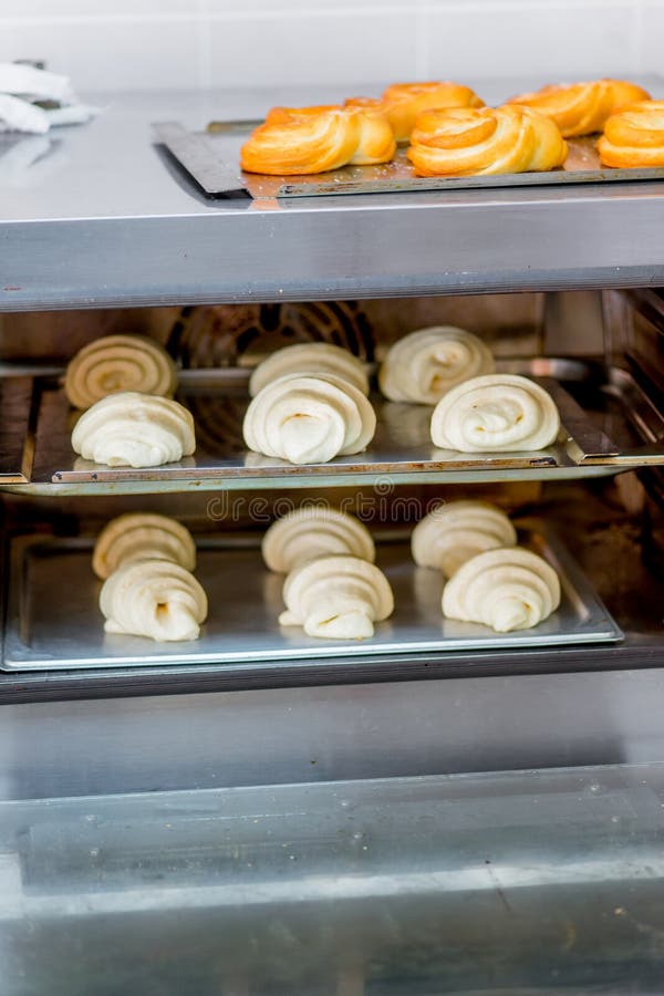 Different Kinds of Pastry are Being Cooked Stock Photo - Image of small ...