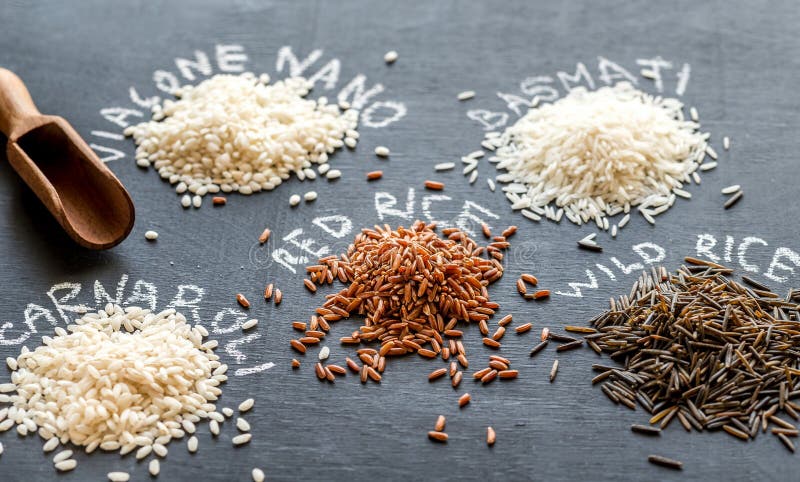 Different Kinds of Rice on the Dark Background Stock Photo - Image of ...