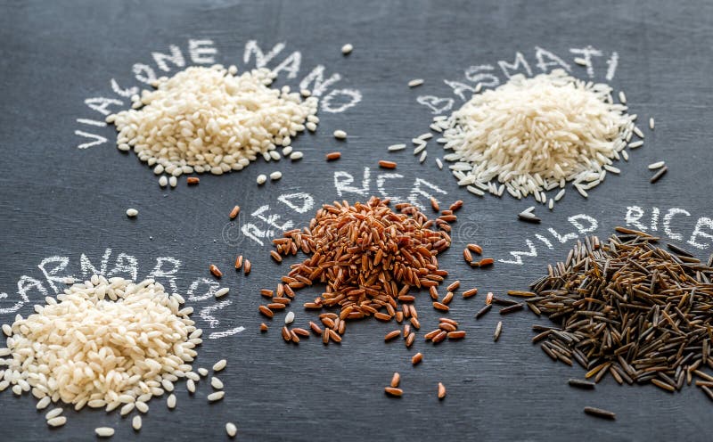 Different Kinds of Rice on the Dark Background Stock Image - Image of ...