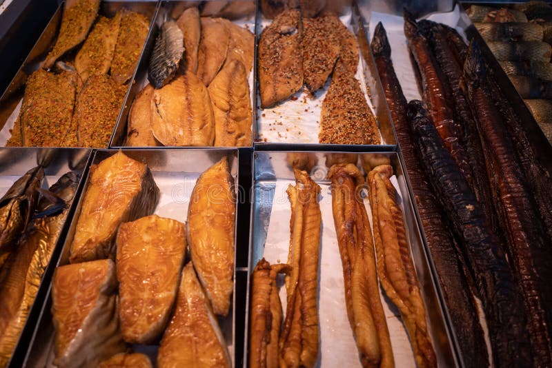 Different Kinds of Smoked Fish Lies in the Display of a Store Stock ...